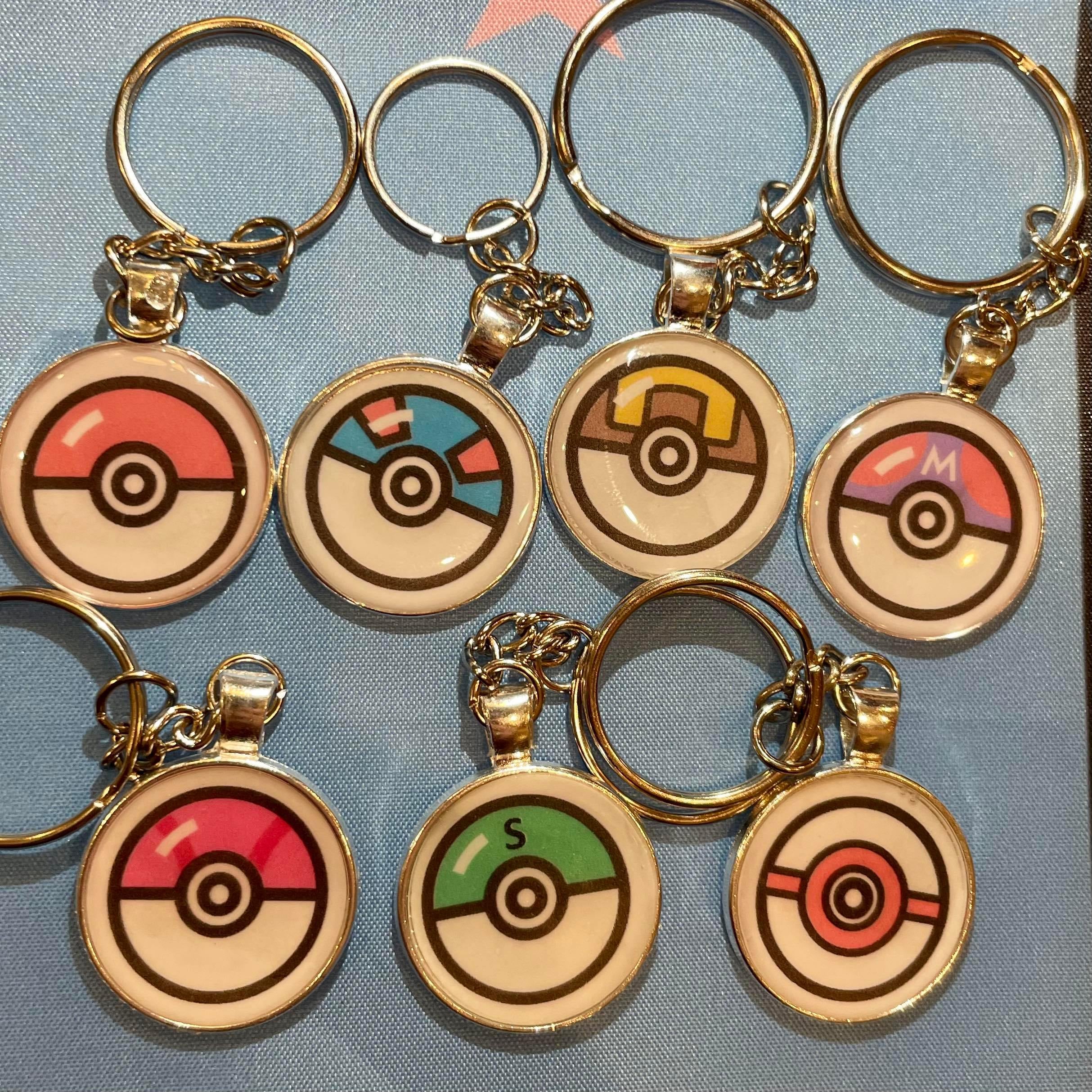Pokéball Keychains | Own Your Pride